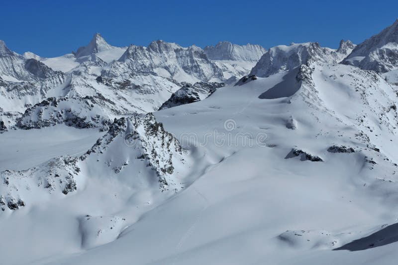 Panorama of swiss alps stock image. Image of skis, initimidating - 13370879