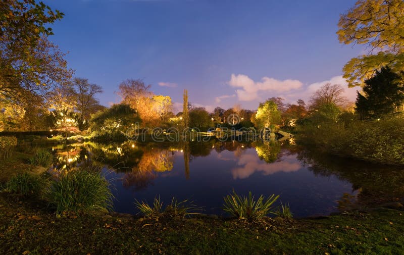 Glass Art on the Pond editorial stock image. Image of pond - 27927694