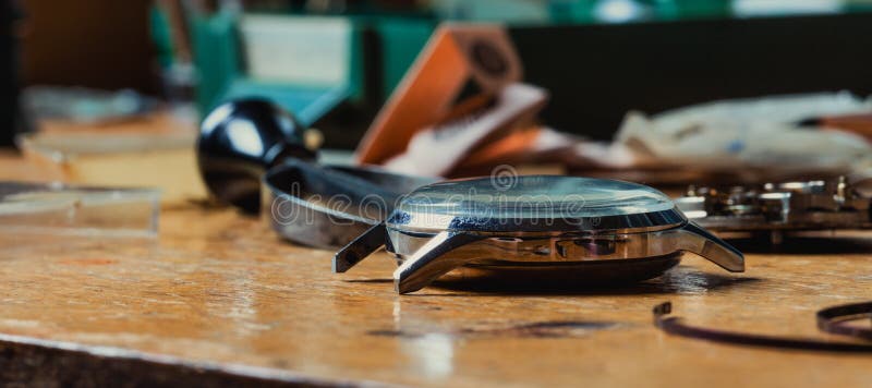 Panorama View of a Wristwatch Lying on a Watchmakers Workbench Stock ...