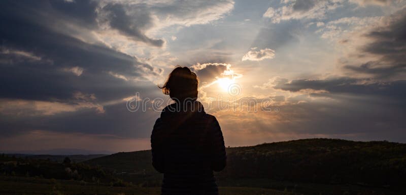 Panorama Woman Head Looking at Sun Breaking through Clouds at Sunset ...