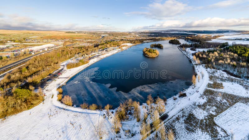 Panoramic Aerial View of a Freezing Lake Surrounded by Snow Stock Photo ...