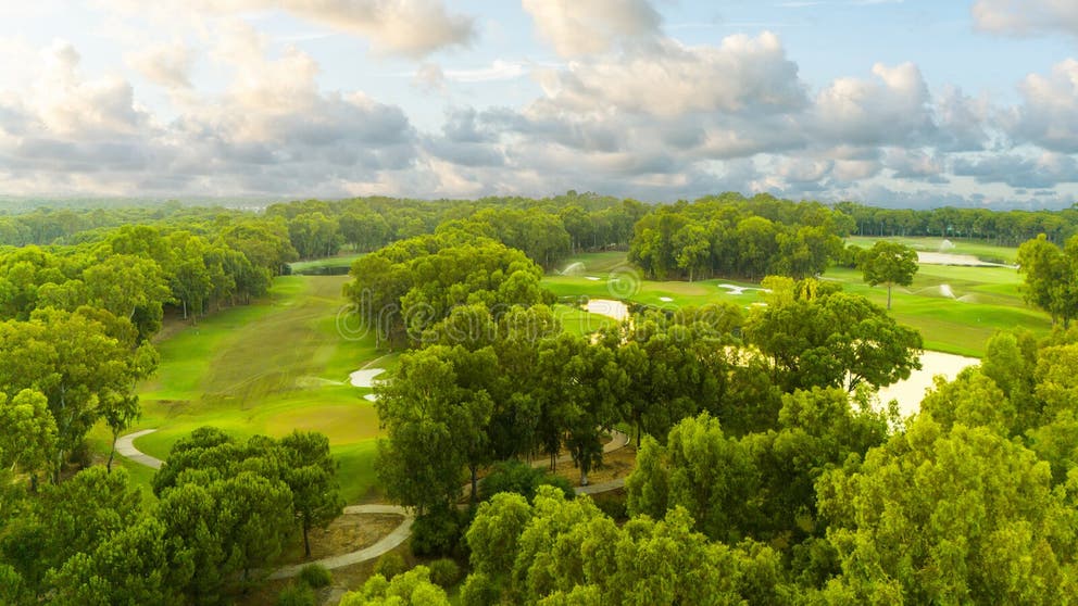 A Panoramic Aerial View of a Golf Course with Lush Greenery and ...