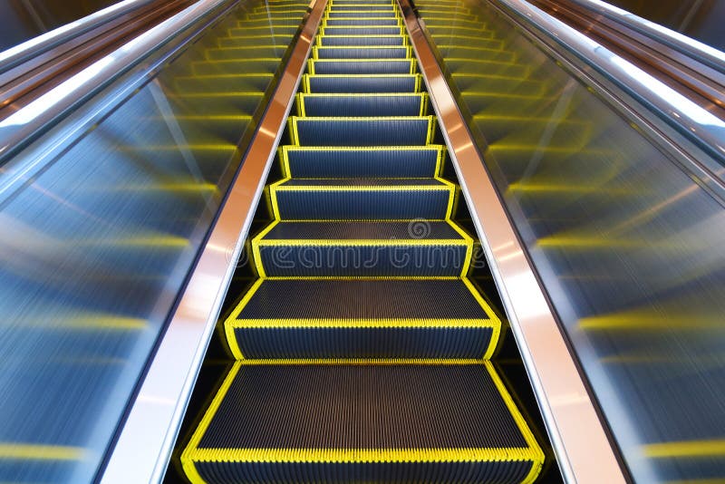 Upward escalator stock image. Image of floor, pattern - 261341405