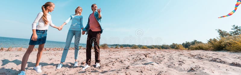 Panoramic of Family Holding Hands and Stock Photo - Image of panorama ...
