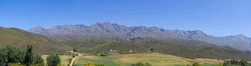 Panoramic Farm Landscape with High Mountains and Fields Stock Image ...