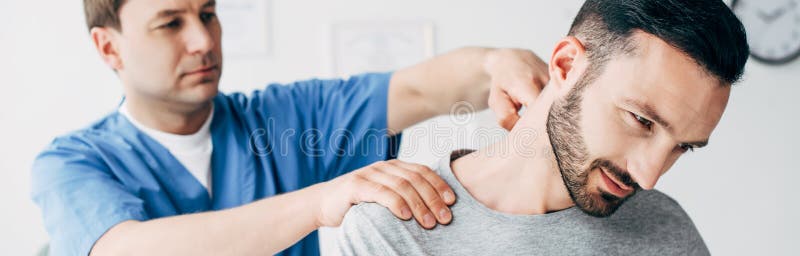 Handsome Chiropractor Working Stock Image - Image of examination ...