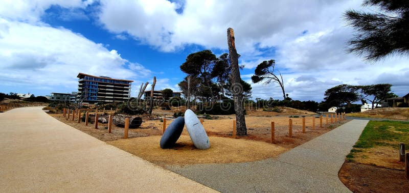 Panoramic Shot of an Empty Park with Buildings on the Background Stock ...