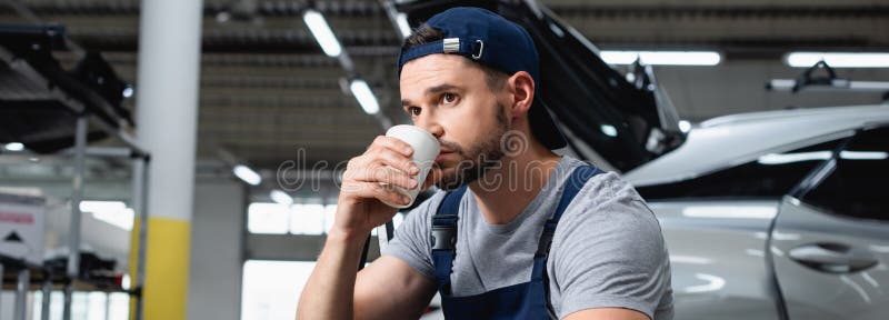 Panoramic Shot of Mechanic in Cap Stock Photo - Image of overalls ...
