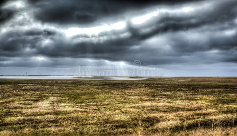Field and stormy sky stock photo. Image of environment - 8518116