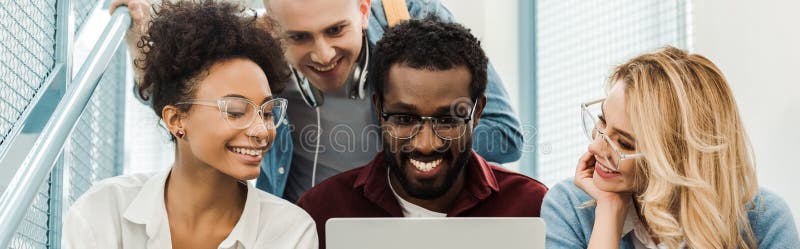 Panoramic Shot of Smiling Multicultural Students with Laptop Stock ...