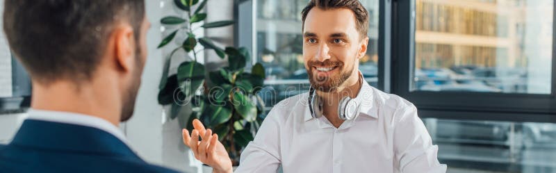 Panoramic Shot of Smiling Translator Working Stock Image - Image of ...