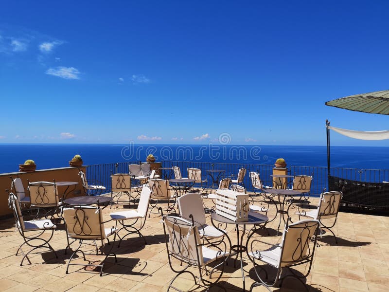 Panoramic Shot of a Terrace with Chairs and Tables a View Over of the ...