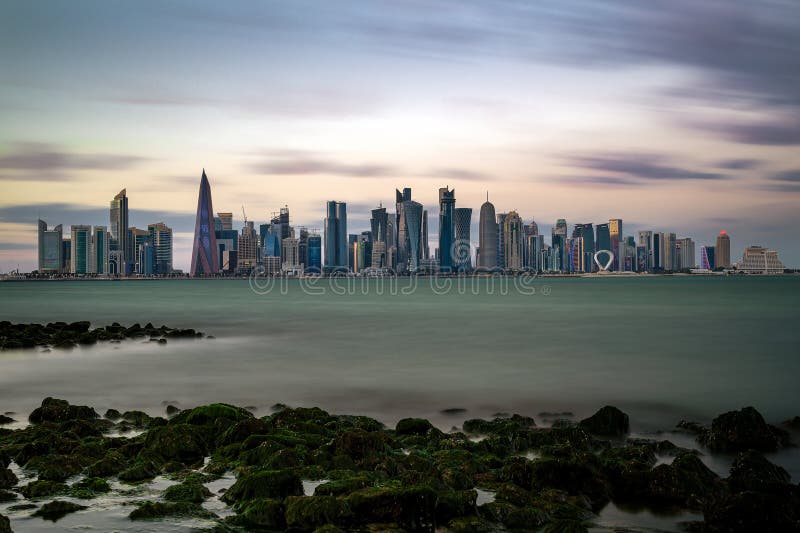 The Panoramic Skyline of Doha, Qatar during Sunrise Sunset Editorial ...