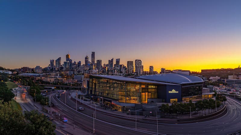 Panoramic Sunset View of City Skyline with Modern Arena Stock Image ...