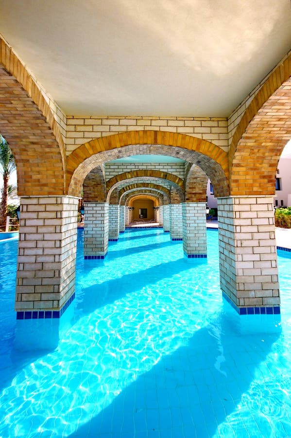 Panoramic Swimming Pool Under Bridge in Resort Stock Image - Image of ...