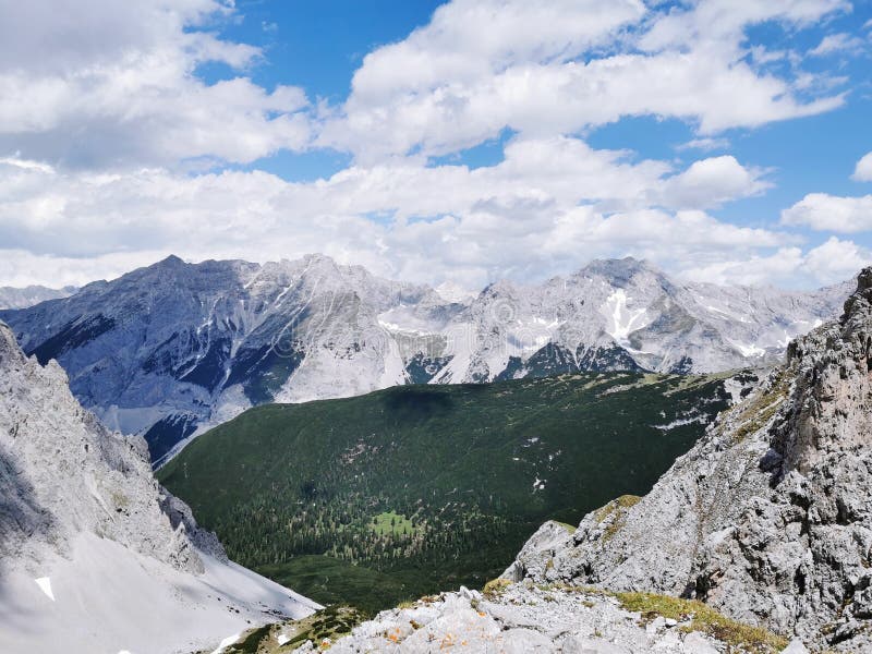 Panoramic View of an Alpine Range with a Valley Stock Image - Image of ...