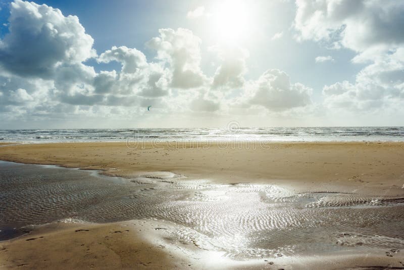 Panoramic View of the Beach and the Mud Flat Sea with a Watercourse ...