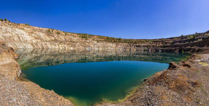 View from the Bottom of a Mining Pit Stock Photo - Image of lake ...