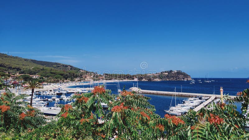 Panoramic View of Cavo Harbour and Beach, in the Background Capo ...
