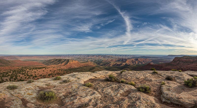 Panoramic View of a Desert Landscape Featuring a Rugged Plateau with ...