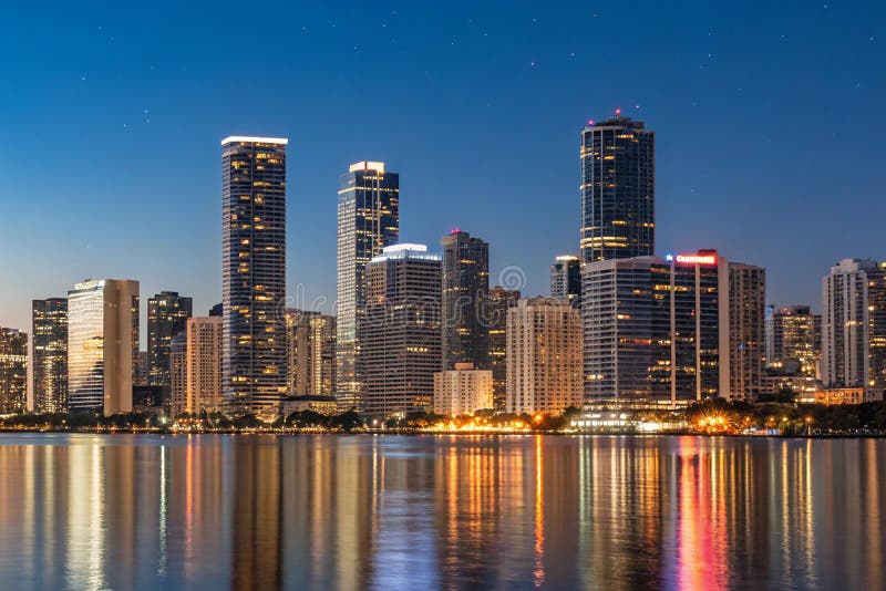 Panoramic View of the Downtown Miami Skyline at Night with Reflections ...