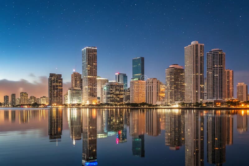 Panoramic View of the Downtown Miami Skyline at Night with Reflections ...