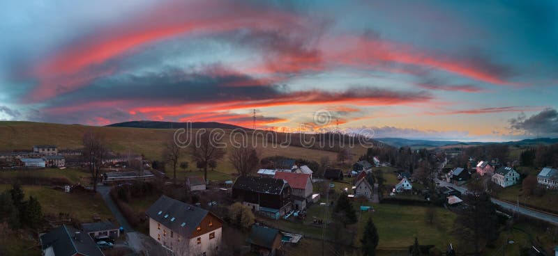 Panoramic View of a Dramatic Pink Sunset Over the Town Stock Image ...