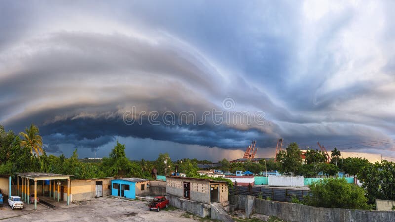 Panoramic View of a Dramatic Storm Cloud Formation Over a Small Town ...