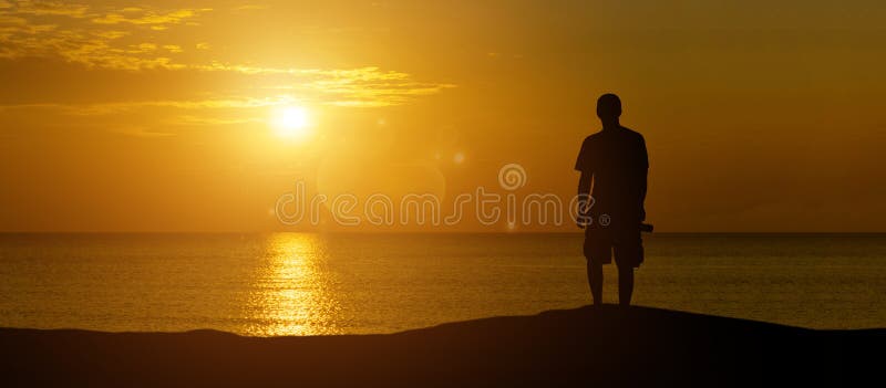 A Panoramic View of a Man Silhouette Holding a Camera Looking at a ...