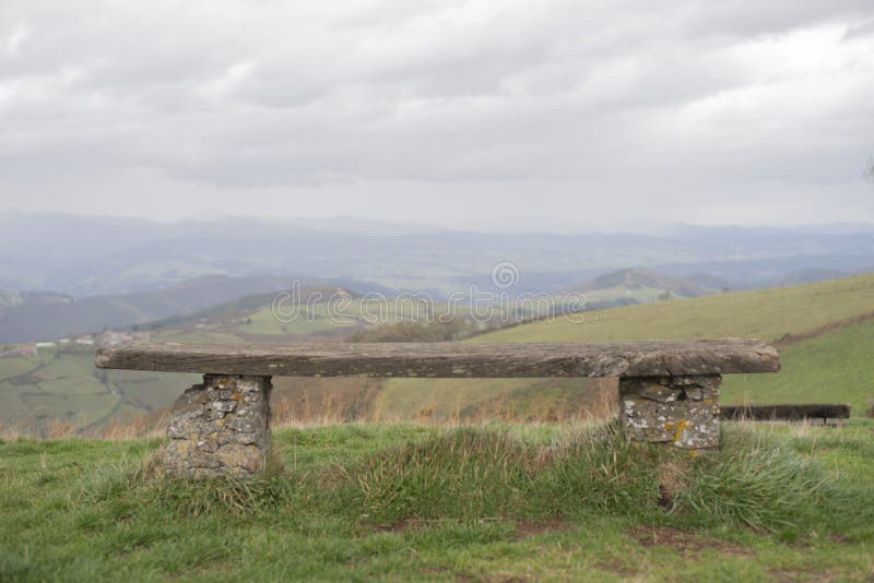 Panoramic View of Mist Covered Mountains Bench in Foreground Stock ...