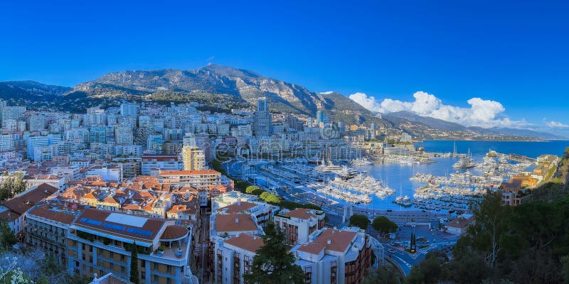 Panoramic View of Monaco Cityscape with Harbor and Mountains Under a ...