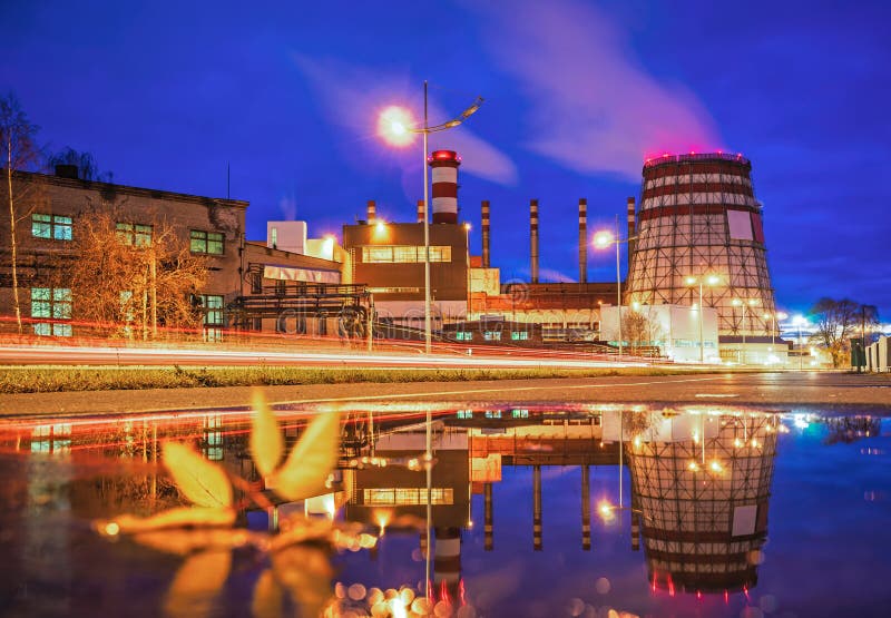 A Panoramic View of the Pipes and Cooling Towers of the CHP. Stock ...