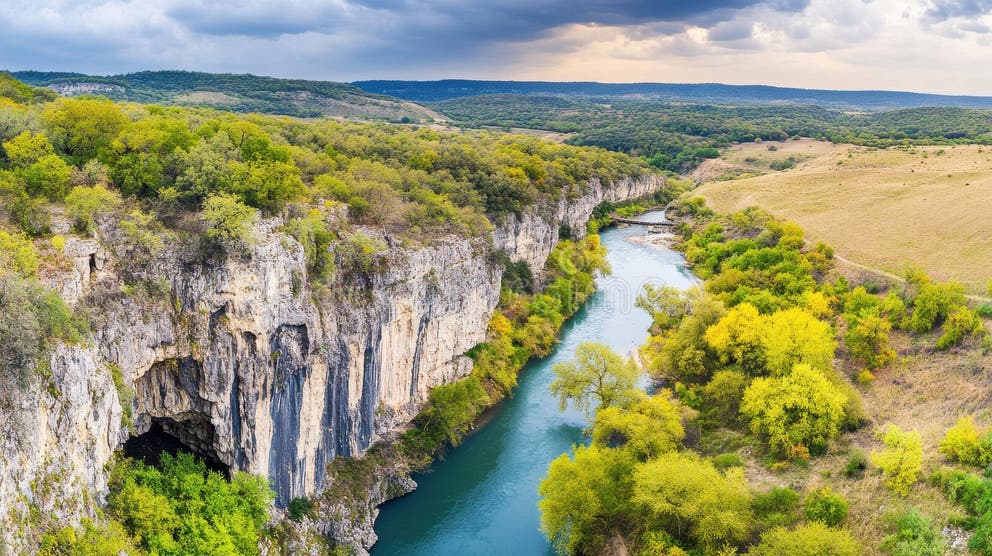 Panoramic View of River Gorge Surrounded by Lush Greenery and Dramatic ...