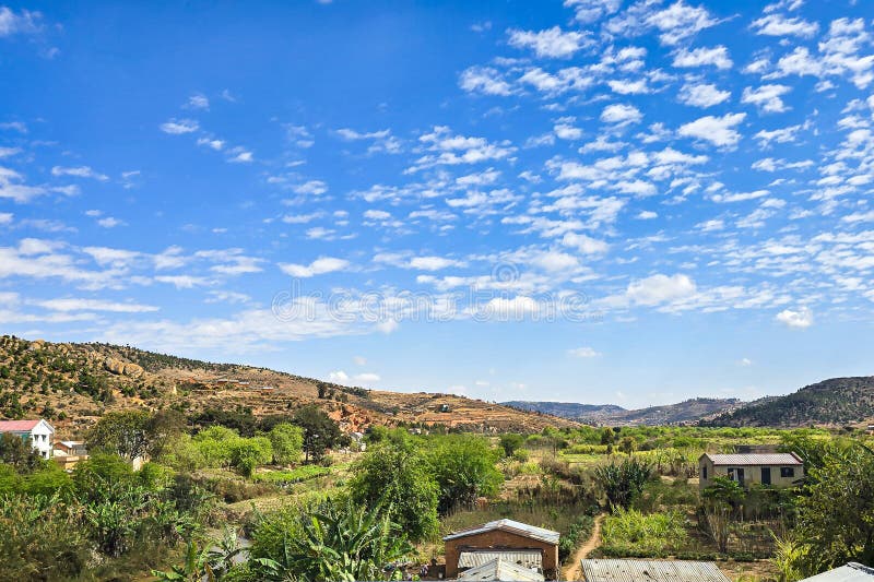 Panoramic View of Rural Madagascar Landscape with Red Hills, Fields and ...