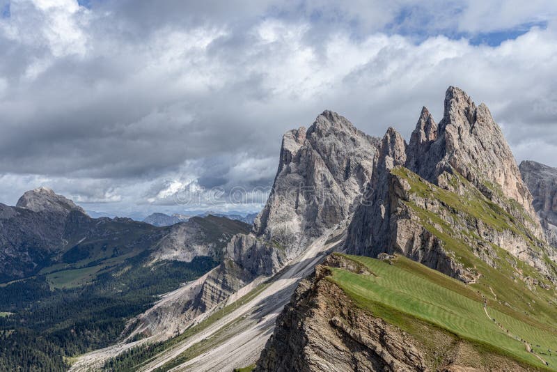 Panoramic View of Seceda Ridge, Dolomites, Showing Sharp Cliffs, Lush ...