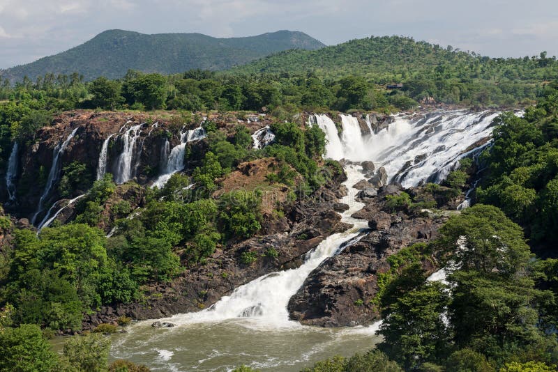 Panoramic View of Small Waterfall Falling Side by Side with Hill in ...