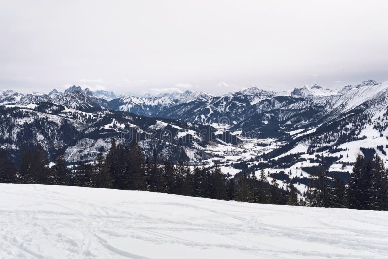 Panoramic View of Snow Covered Alpine Mountains Stock Photo - Image of ...
