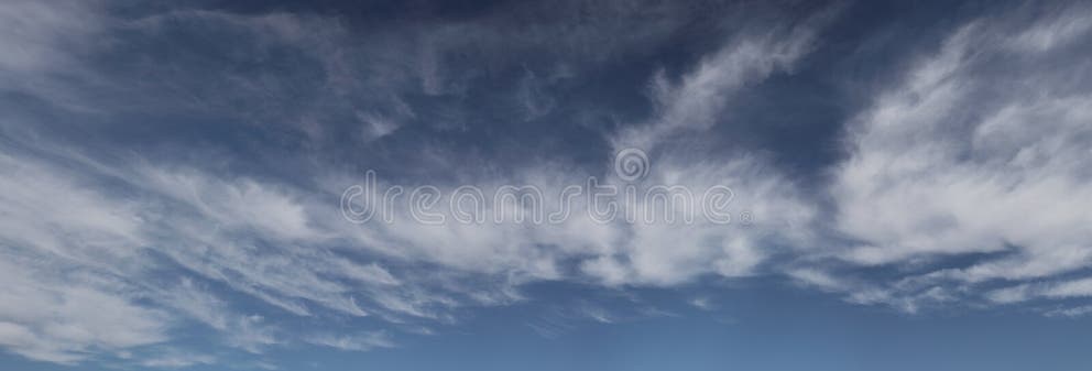 Sweeping Panorama of Soft Wind Swept Clouds in Blue Sky. Stock Image ...