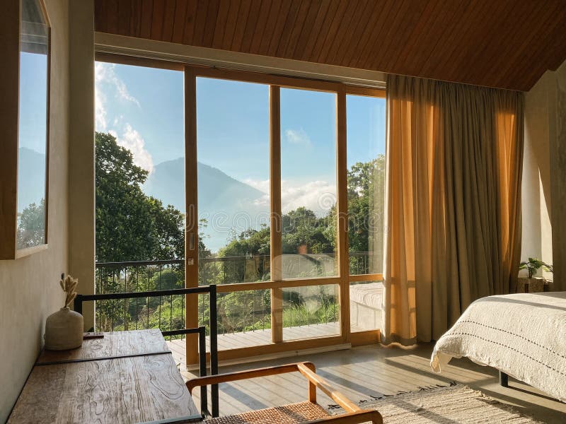 Panoramic Windows in Bedroom with Stunning View Stock Photo - Image of ...
