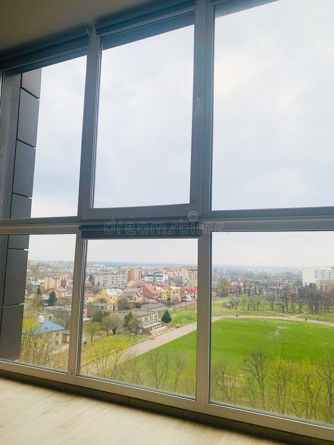 Beautiful Views of the Large, Wooden Windows that Overlook the Balcony ...