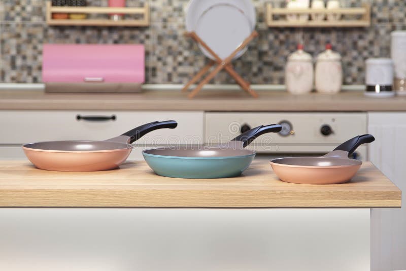 Pans on Wooden Counter of Kitchen Stock Image - Image of meal, wooden ...