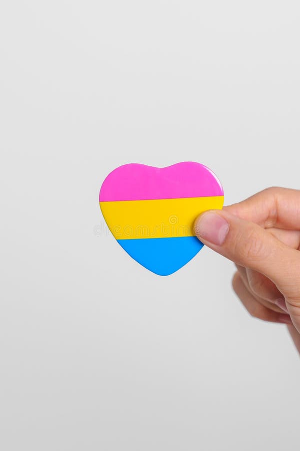 Pansexual Pride Day And Lgbt Pride Month Concept Hand Holding Pink