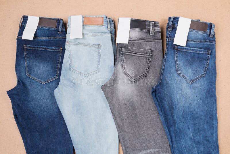 Pants Jeans of Different Colors Lined Up in a Row, Concept Clothes, Top ...