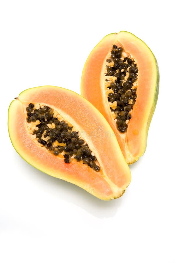 Mitades de papaya foto de archivo. Imagen de halved, adentro - 1352258