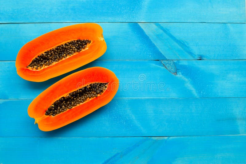 Papaya Fruit on Blue Wooden Stock Photo - Image of color, papaya: 136245348