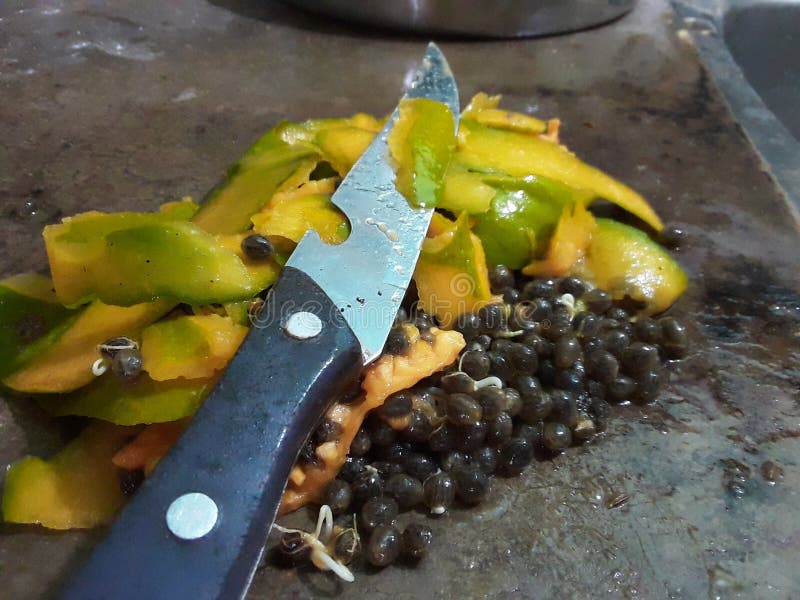 Papaya Seeds Papita Beej. Papaya Black Seeds with Knife Stock Image ... Papaya Seeds Papita Beej. Papaya Black Seeds with Knife Stock Image ...