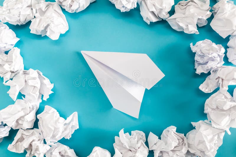 Success Concept, a Origami Paper Bird and Crumpled Paper Balls Stock ...