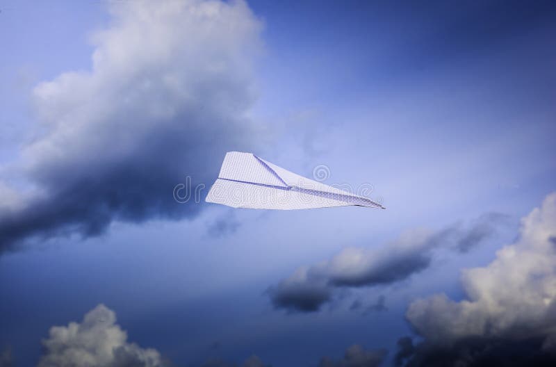 Paper Airplane Flying in the Sky in the Clouds Stock Image - Image of ...