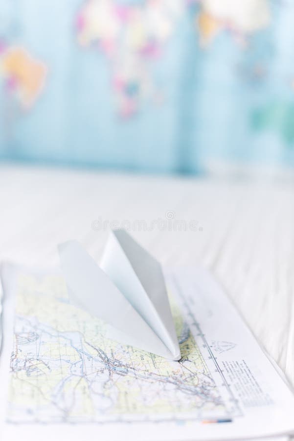 Paper Airplane on the Map with Beach Small Umbrellas for a Cocktail ...