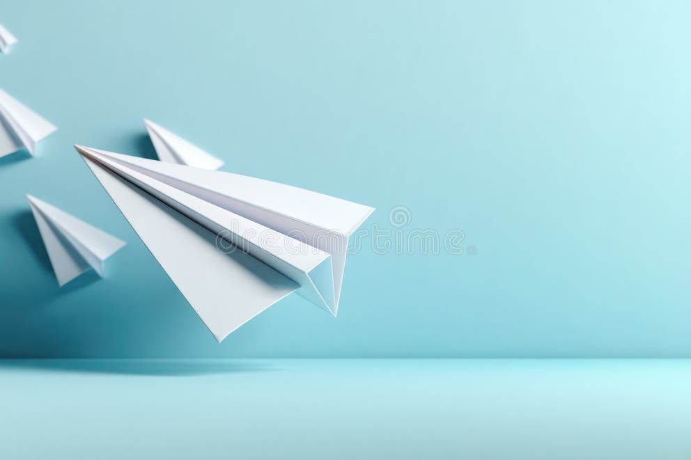 Paper Airplanes Soaring through a Blue Background, Showcasing Motion ...
